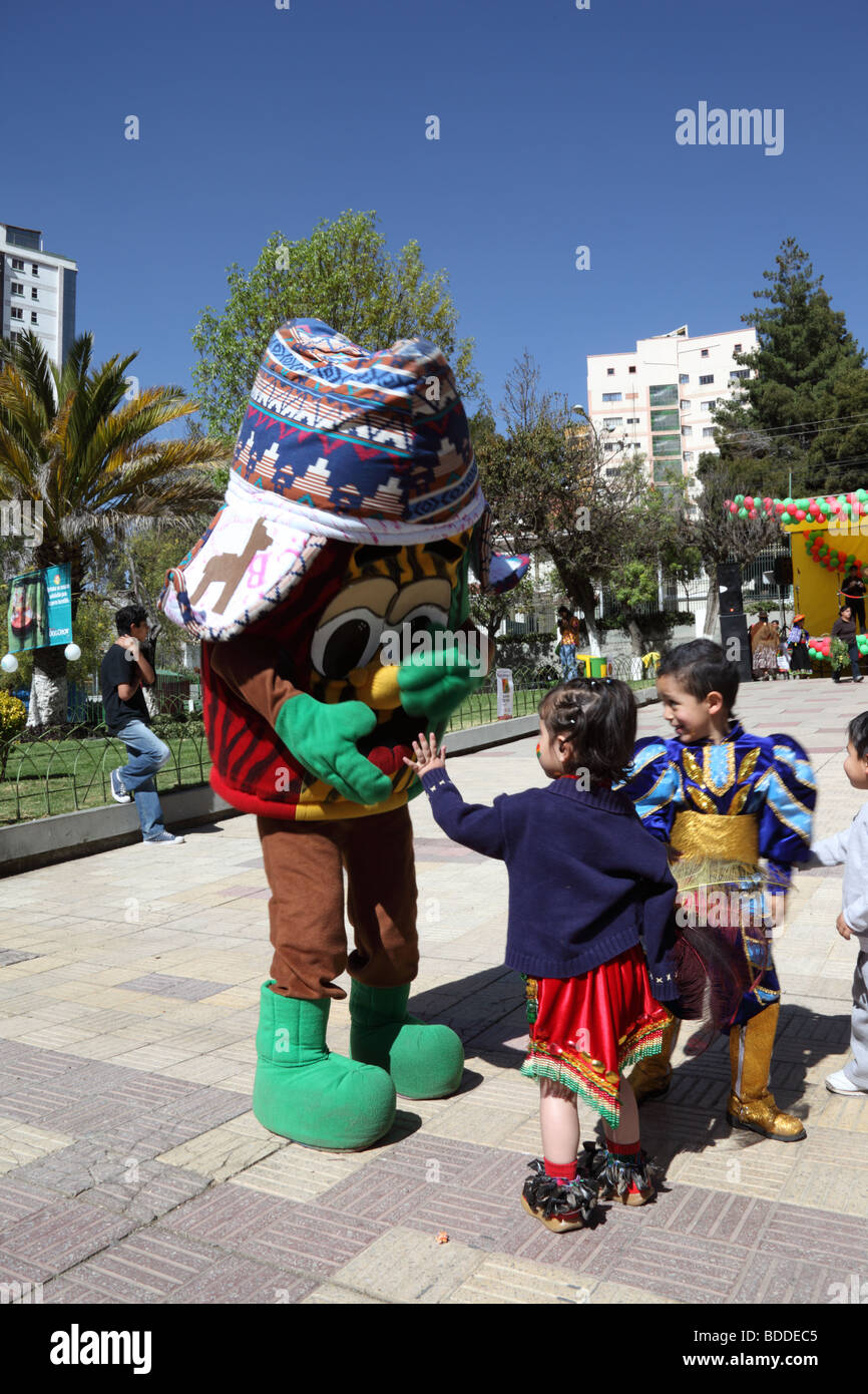 Children with a person dressed as a fingerprint, the mascot / symbol of ...