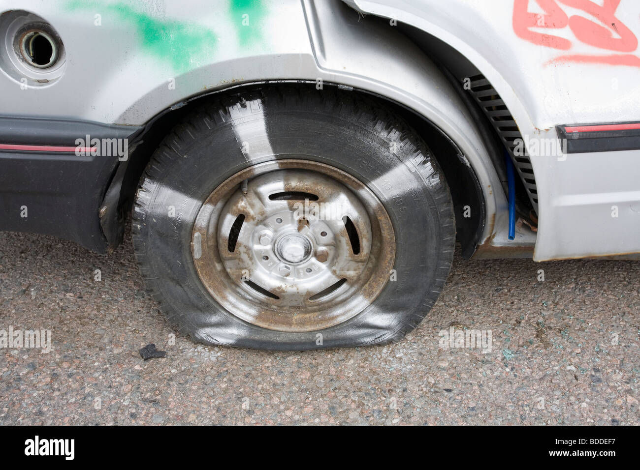 Car with destroyed tire hi-res stock photography and images - Alamy