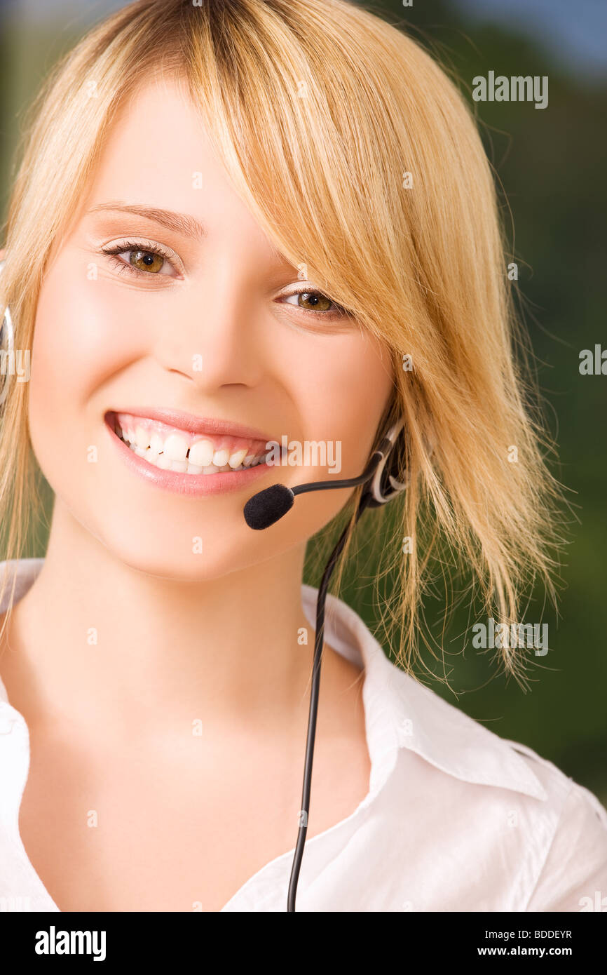 bright picture of friendly female helpline operator Stock Photo - Alamy