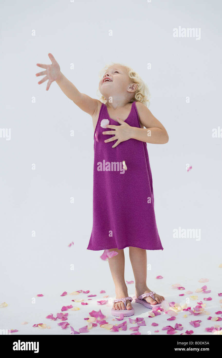 Petals falling hand hi-res stock photography and images - Alamy