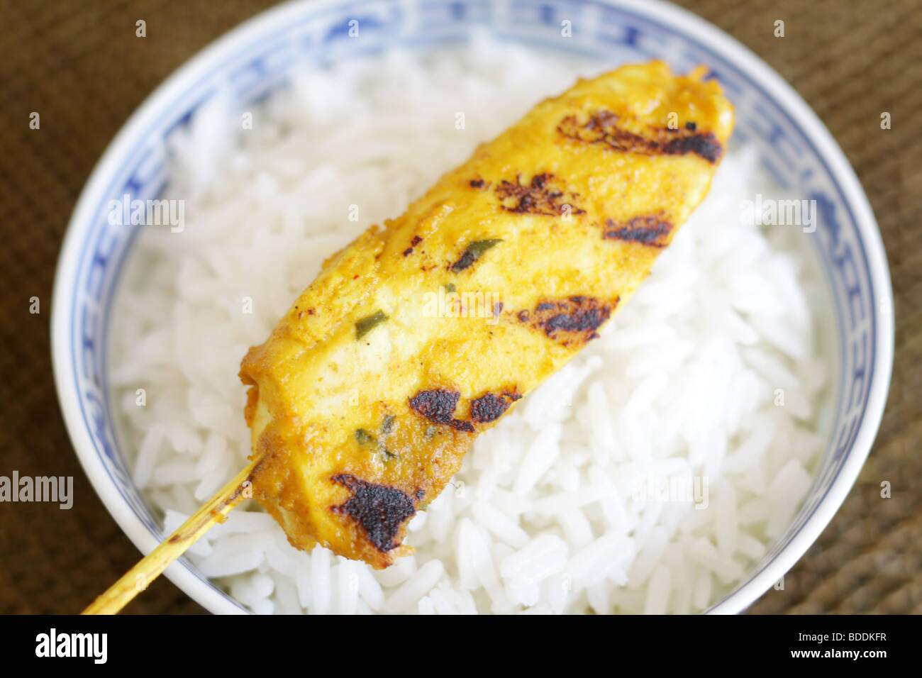 Satay Chicken with Rice Stock Photo - Alamy