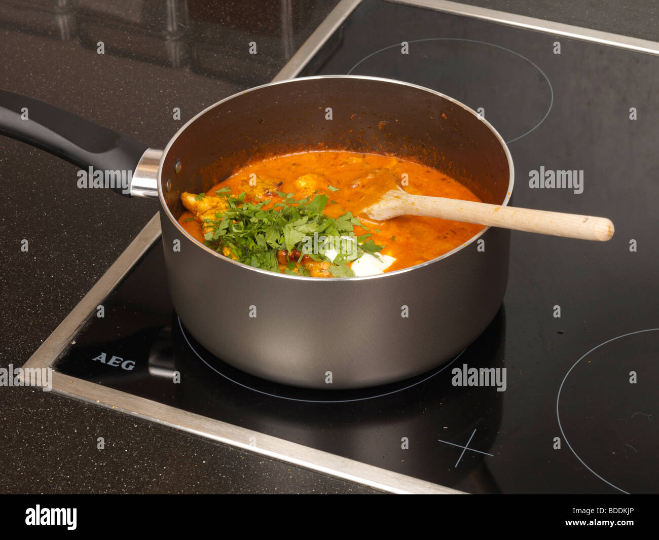 Shot 7 (Mixing Yogurt into Sauce Stock Photo - Alamy