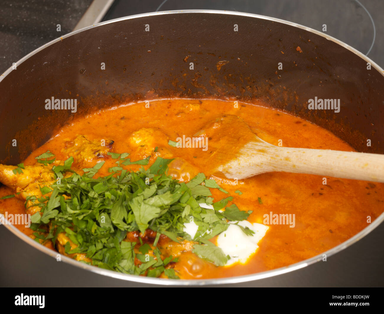 Shot 7 (Mixing Yogurt into Sauce Stock Photo - Alamy