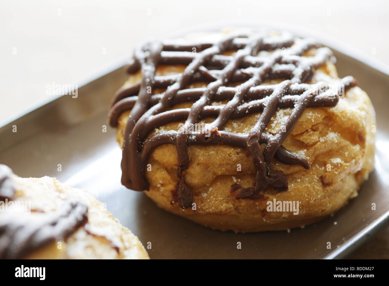 Custard Choux Bun Stock Photo - Alamy