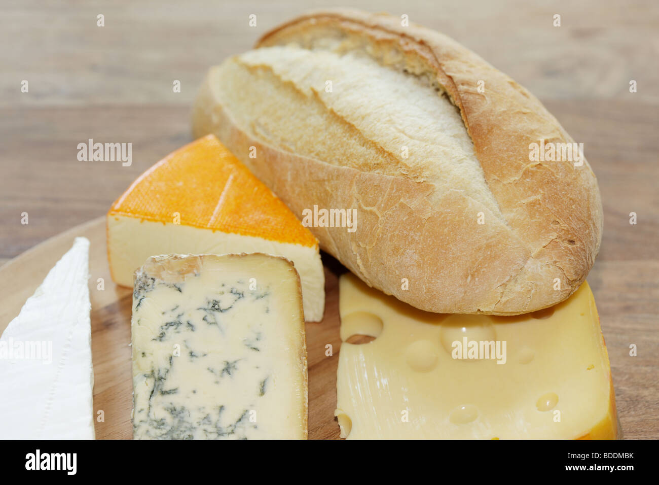 Selection of Cheeses with Bread Stock Photo - Alamy