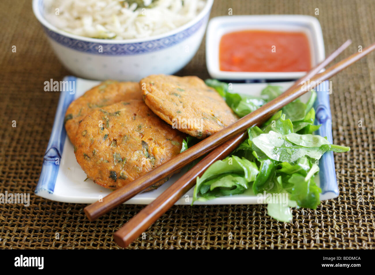 Thai Fish Cakes with Rice Stock Photo - Alamy