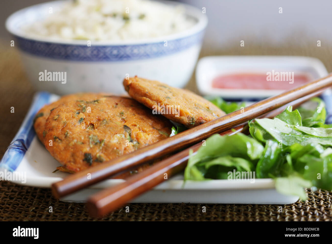 Thai Fish Cakes with Rice Stock Photo - Alamy