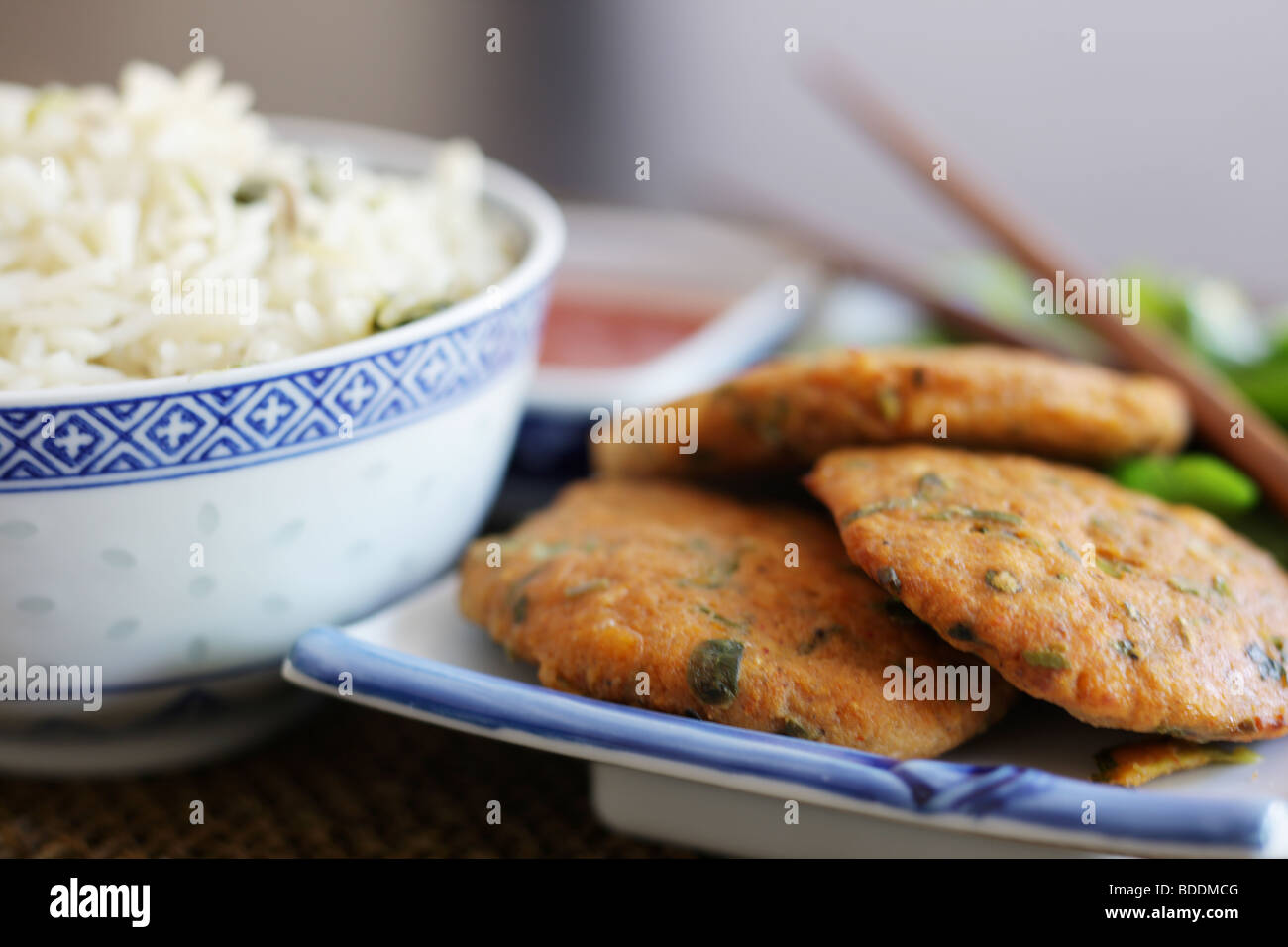 Thai Fish Cakes with Rice Stock Photo - Alamy