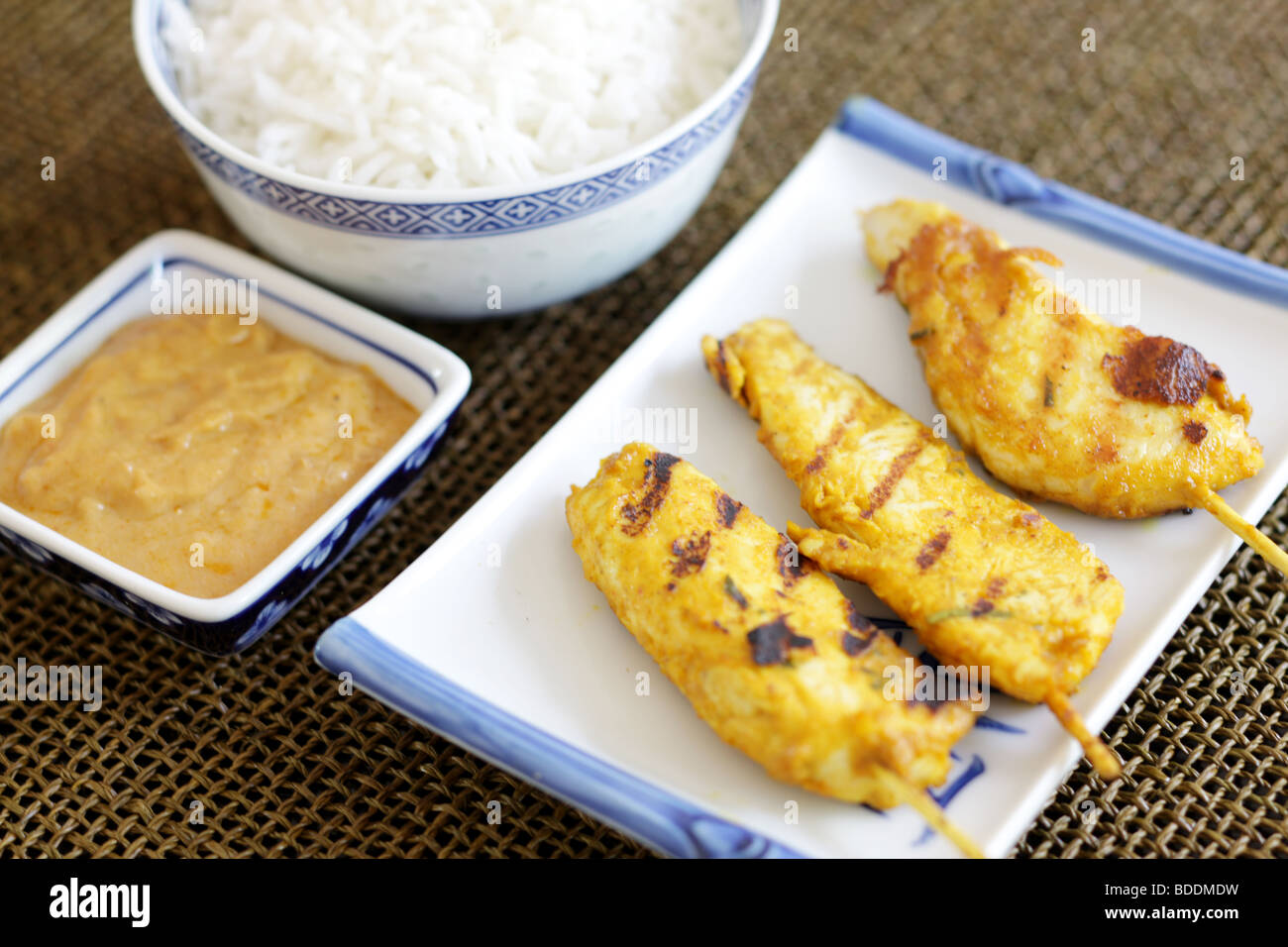Satay Chicken with Rice Stock Photo - Alamy