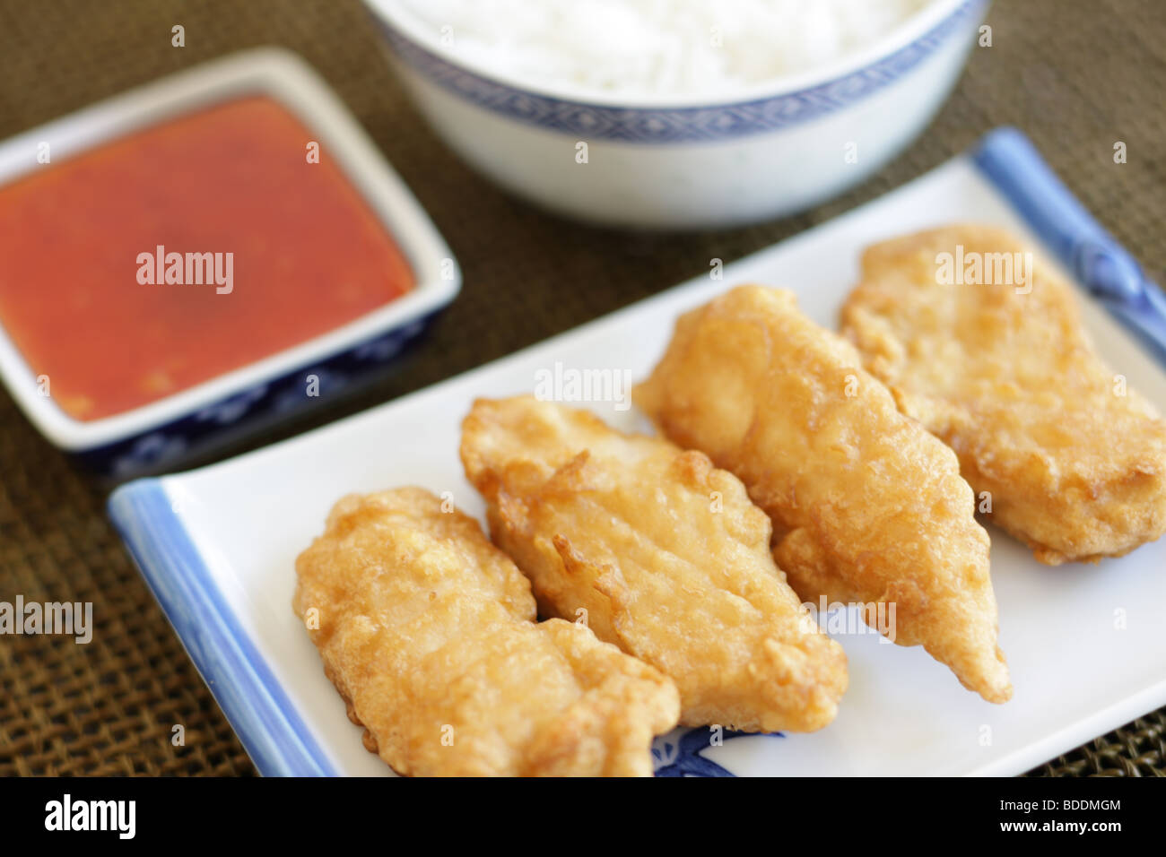 Battered Chicken and Sweet Chilli Dip with Rice Stock Photo - Alamy