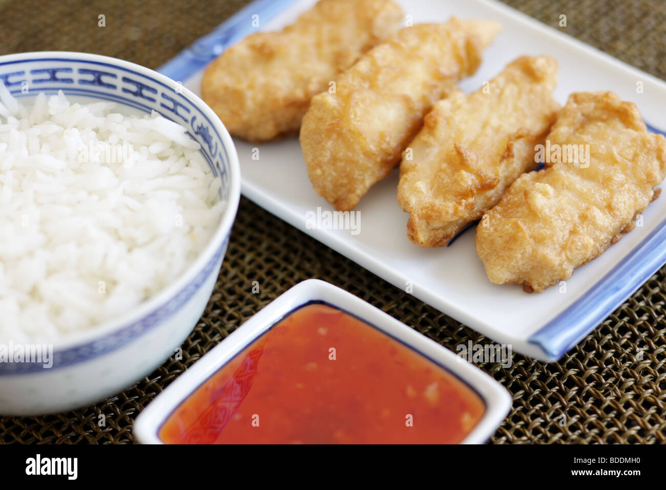 Battered Chicken and Sweet Chilli Dip with Rice Stock Photo - Alamy