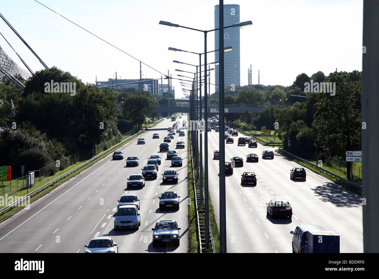 A busy main road next to the Munich Olympic park complex, Germany Stock ...