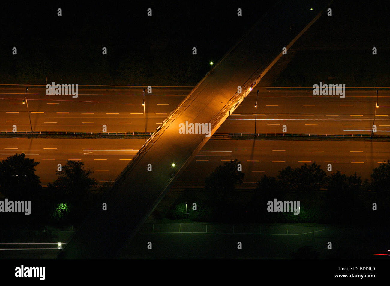 Highway overpass at night from high above. In the Munich Olympic park ...