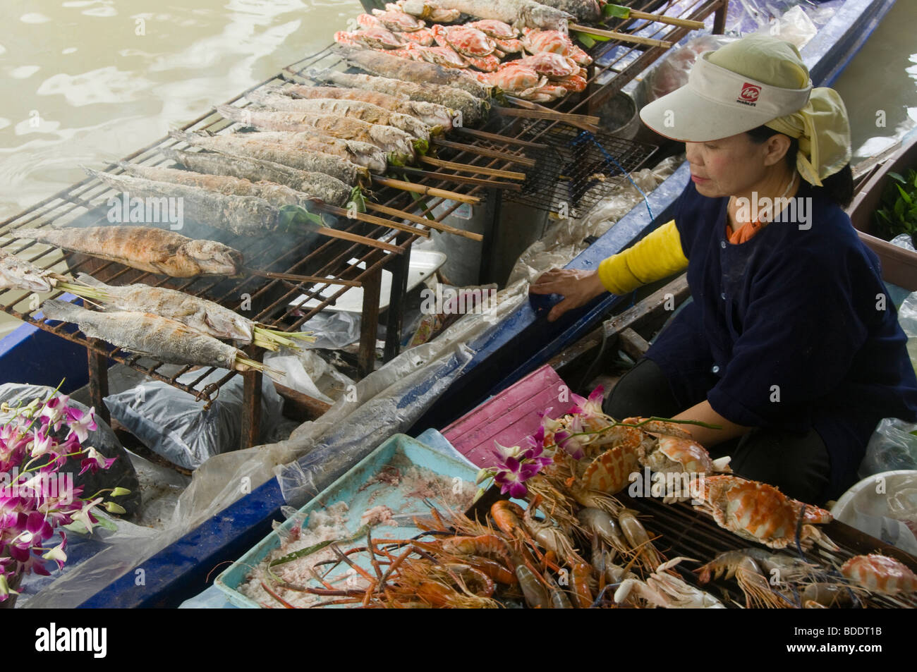 seafood vendor at a floating market in Bangkok Thailand Stock Photo - Alamy