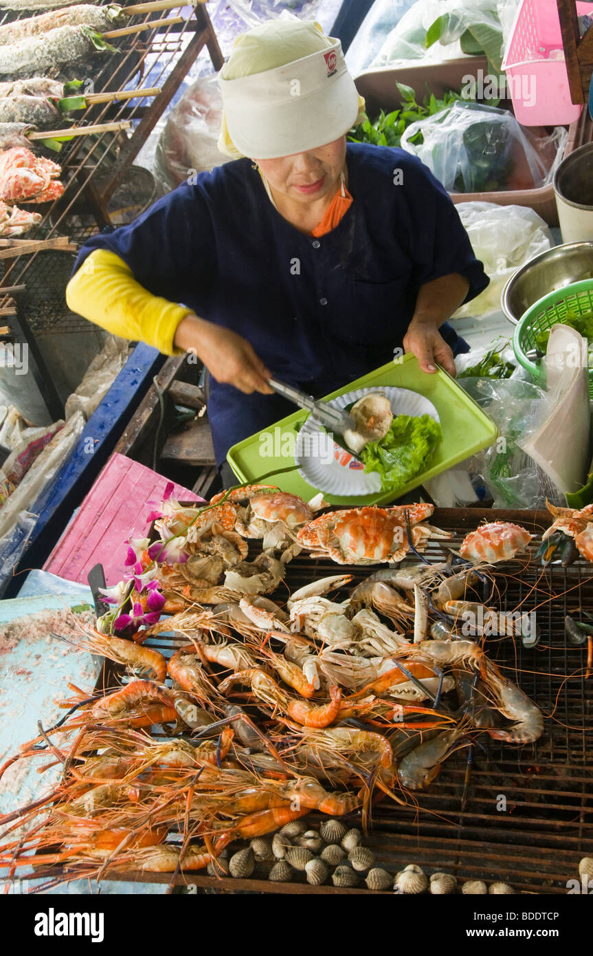 seafood vendor at a floating market in Bangkok Thailand Stock Photo - Alamy