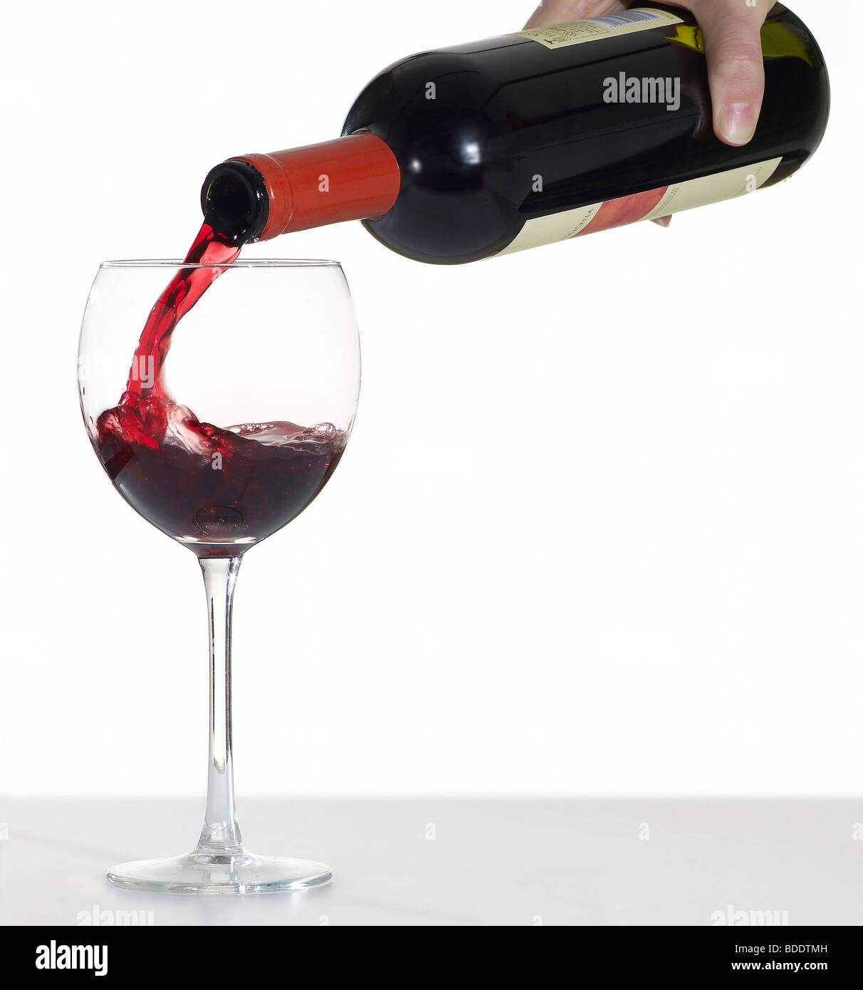 pouring red wine Stock Photo - Alamy