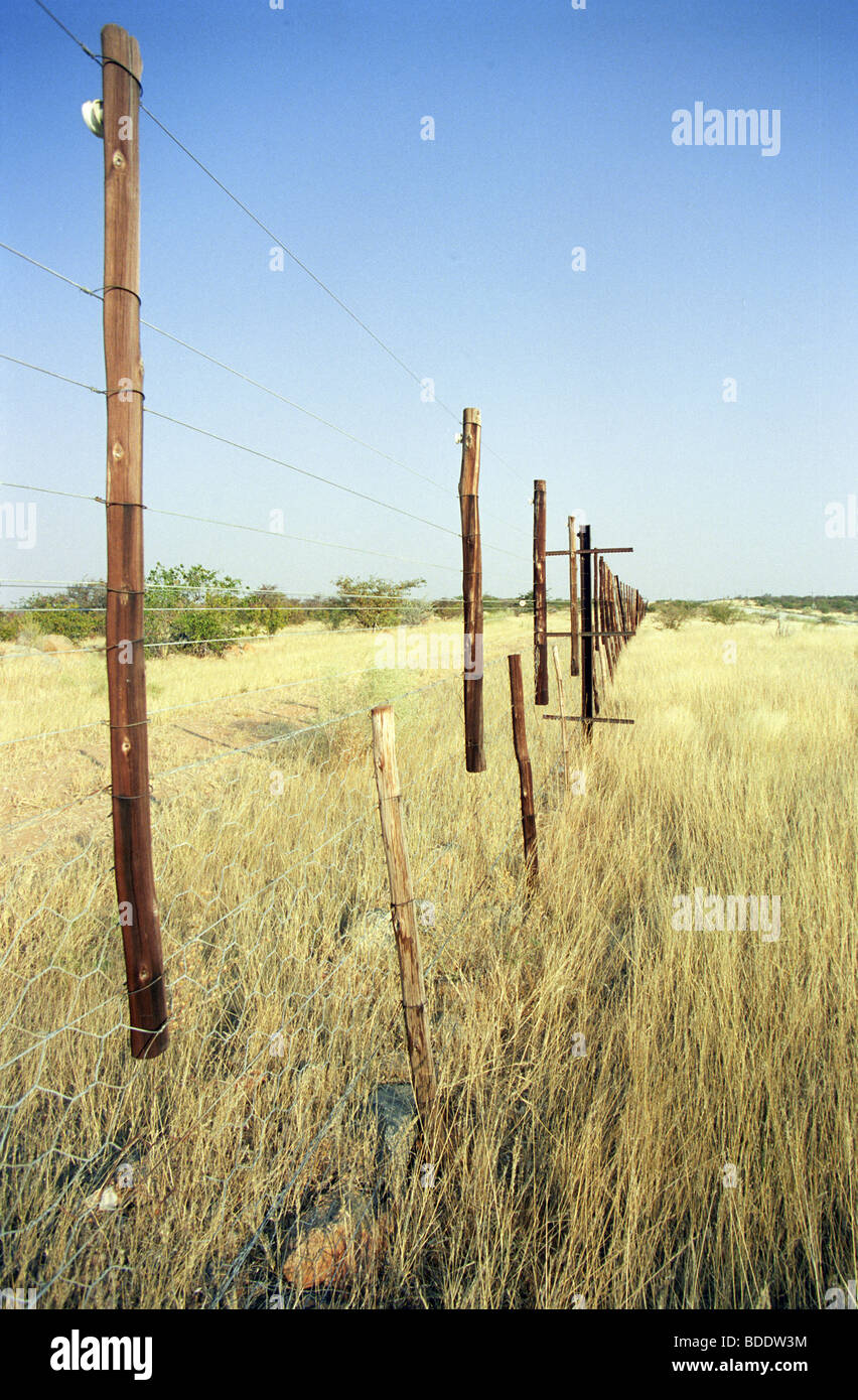 Fence at the western boundary of Etosha National Park in Namibia Stock ...