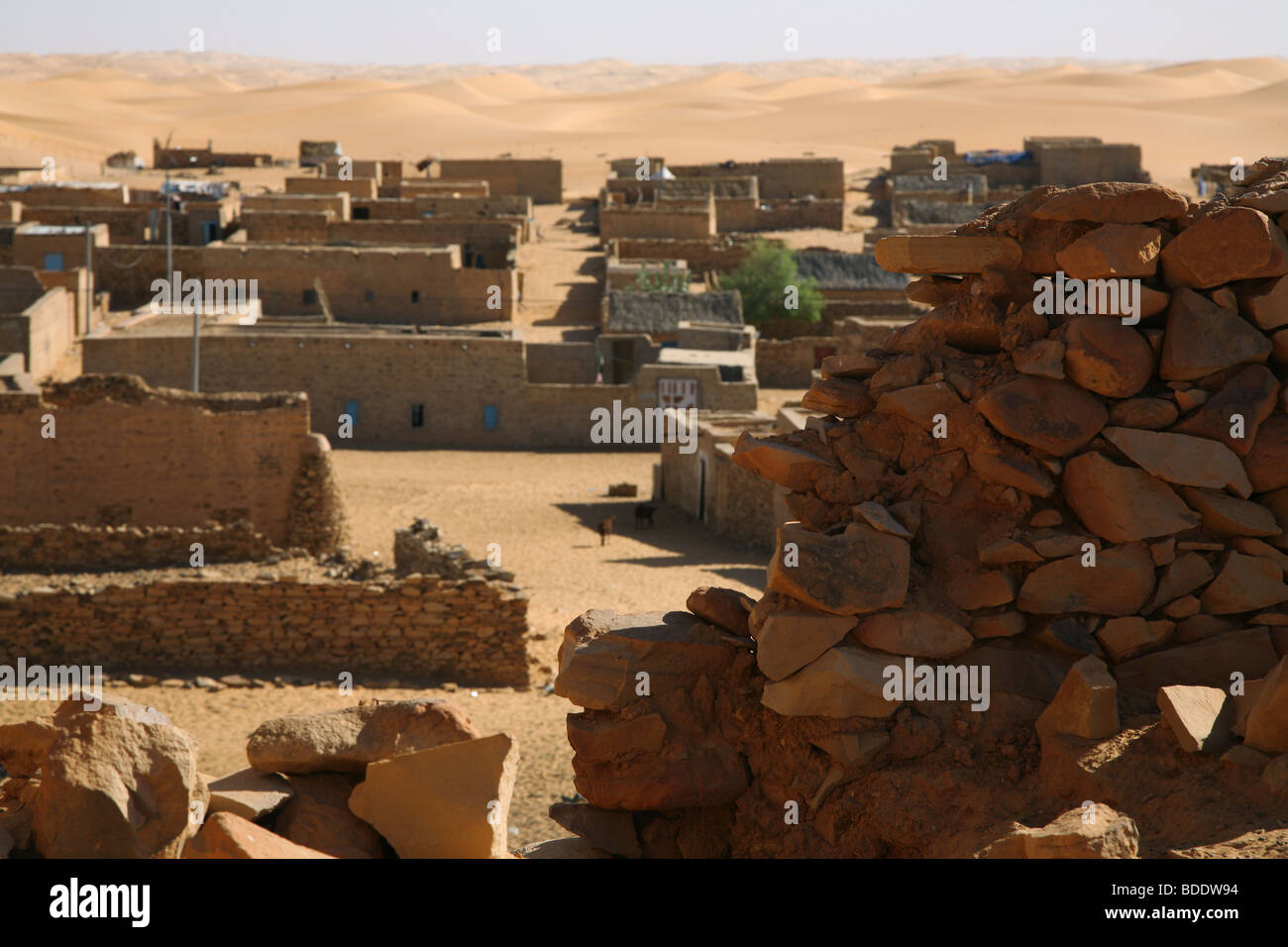 The ancient and half swallowed by sand town of Chinguetti, on the edge ...