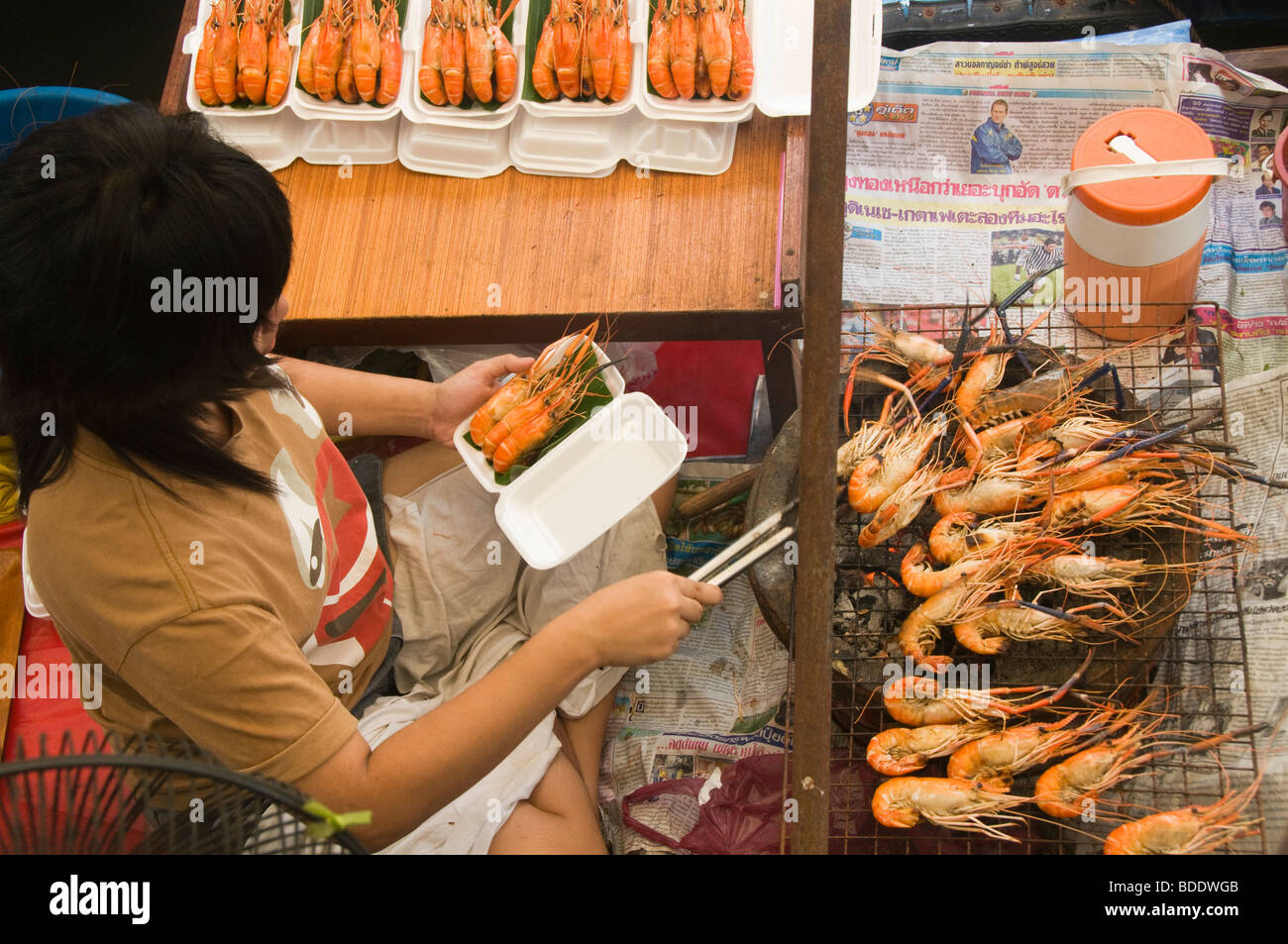 seafood vendor at a floating market in Bangkok Thailand Stock Photo - Alamy