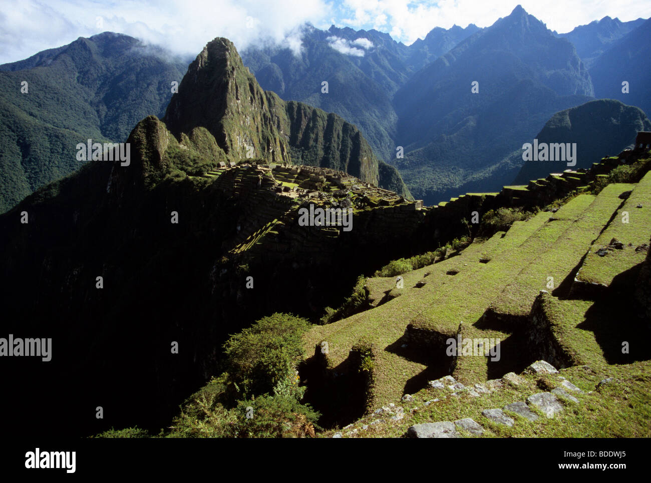 The classic perspective over the ruined Inca city of Machu Picchu, Peru ...