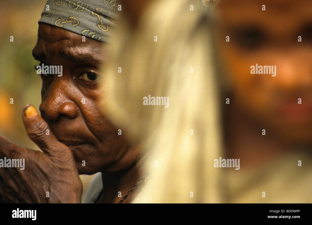 An elderly Baka Pygmy woman and young child in a remote village in the ...