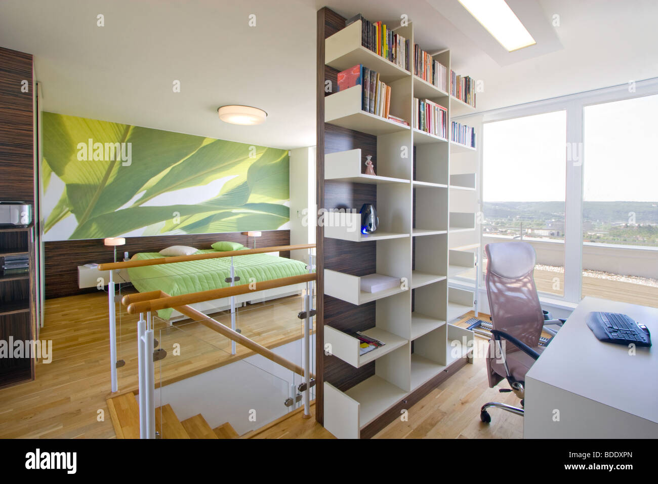 Bedroom and study in modern house Stock Photo - Alamy