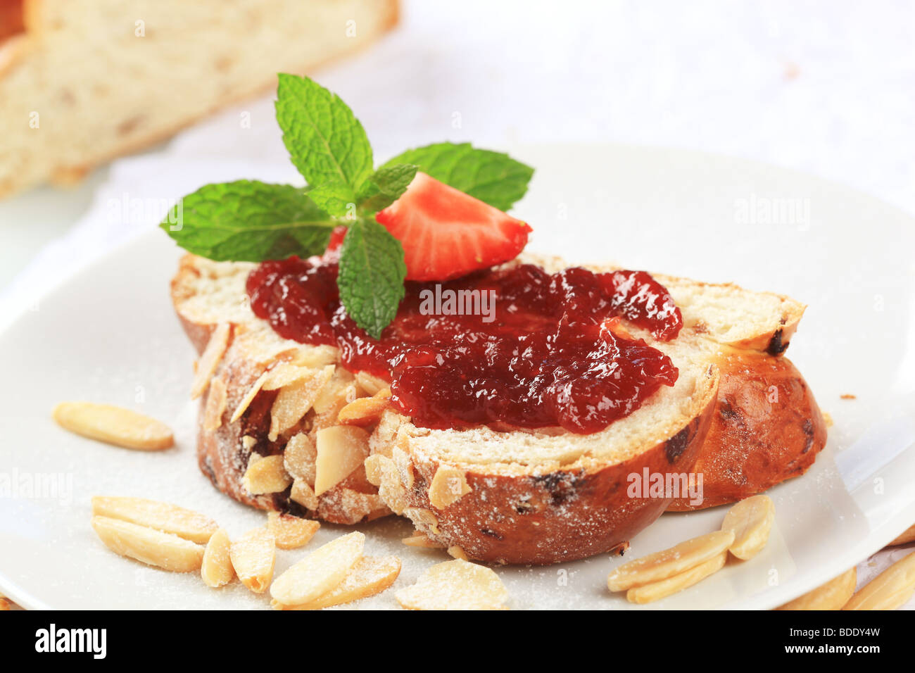 Slice of sweet bread and jam Stock Photo - Alamy