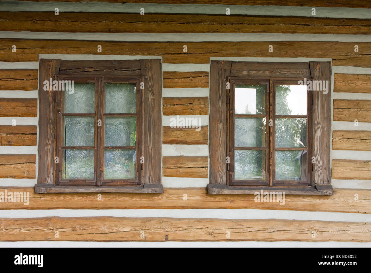 Windows of wood old houses Stock Photo - Alamy