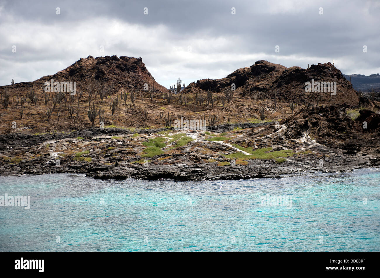 Volcanic rock coastline of Rabida Island, Galapagos Islands, Ecuador ...