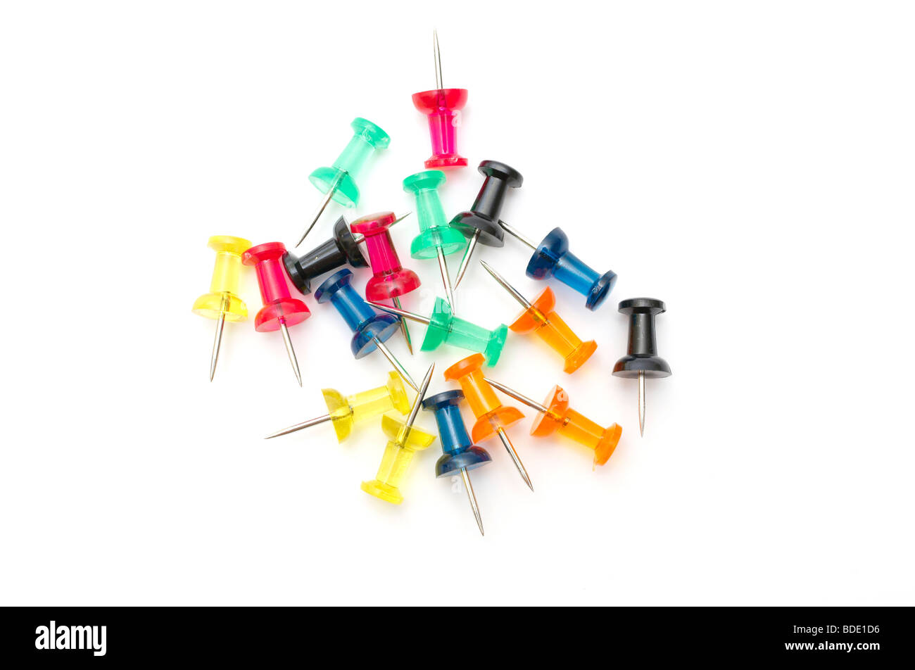 Different color drawing-pins on white background Stock Photo - Alamy