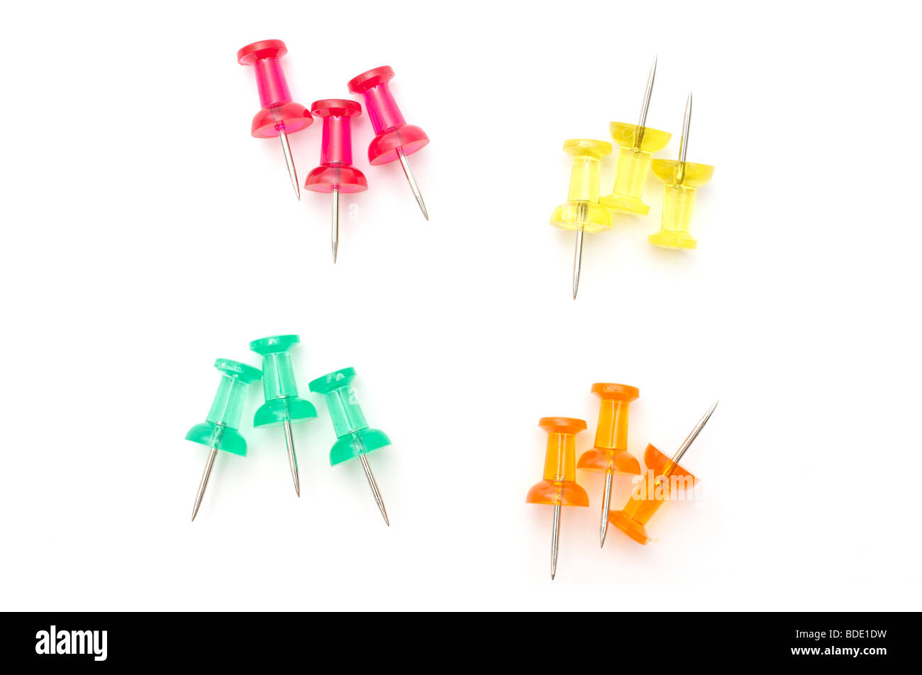 Different color drawing-pins on white background Stock Photo - Alamy