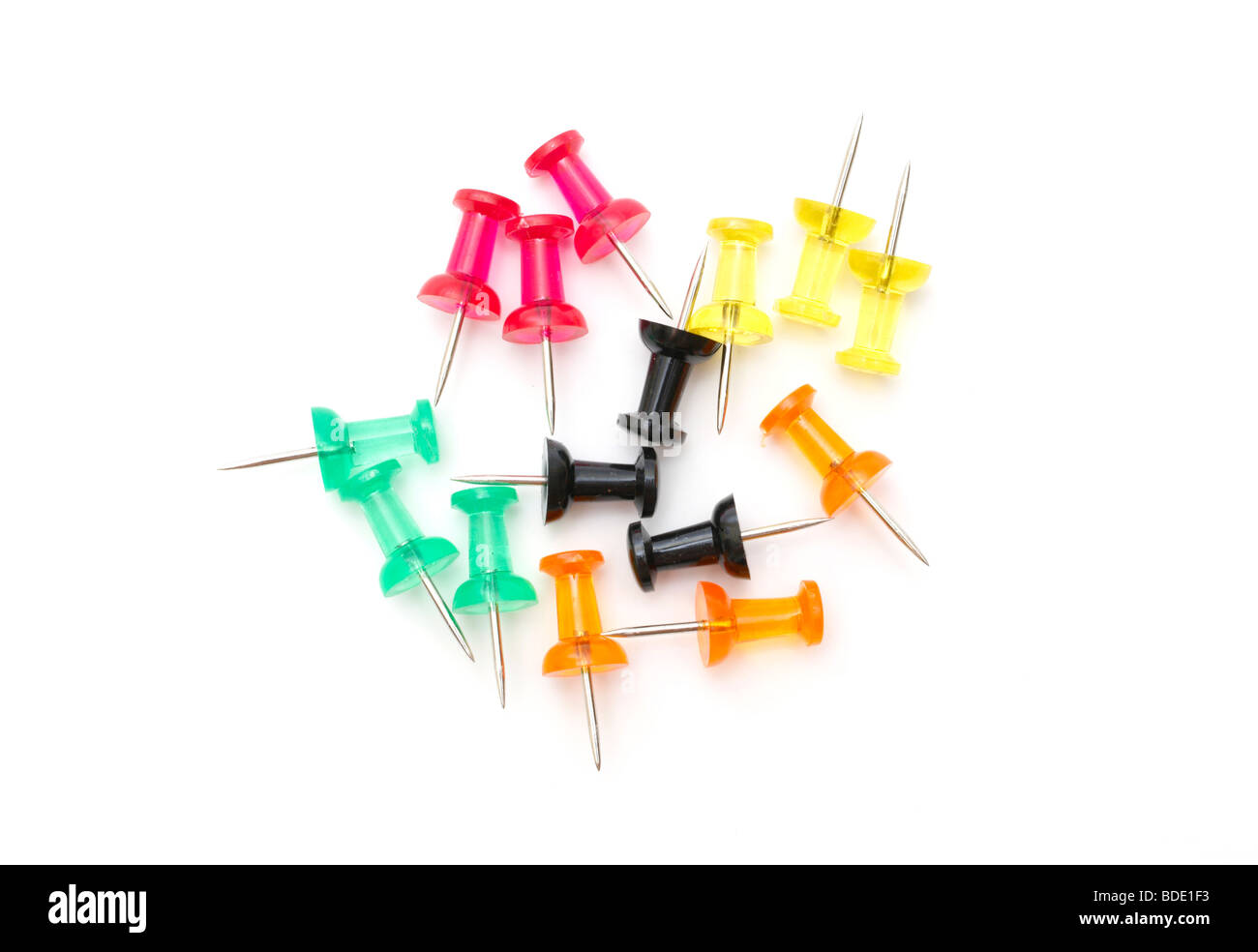 Different color drawing-pins on white background Stock Photo - Alamy