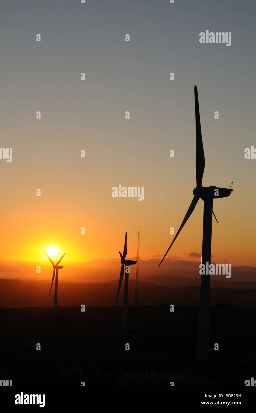 Windturbines on Caton Moor, with lakeland hills in the distance at ...