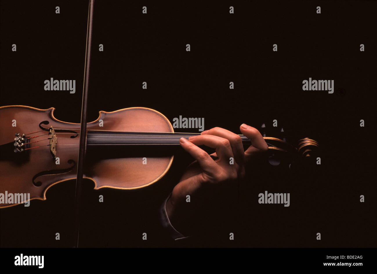 Playing a violin Stock Photo - Alamy