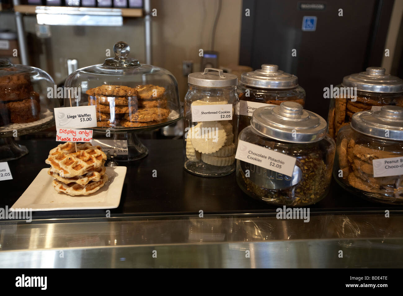 Desserts, sweets on display in deli restaurant Stock Photo - Alamy