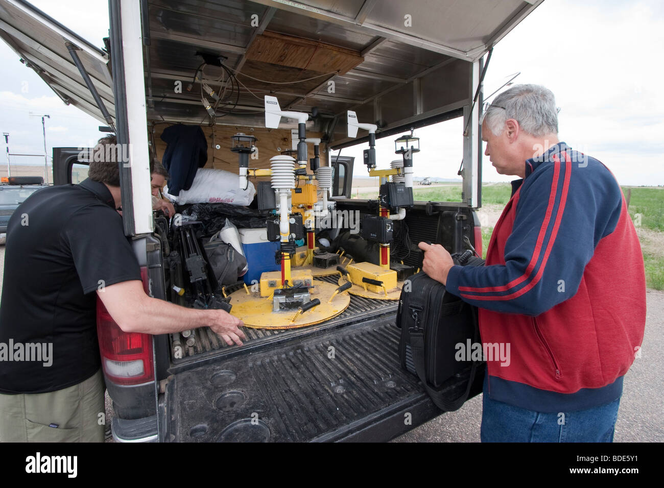 Storm chaser Tim Marshall (left) and photographer Mike Tittel (left ...