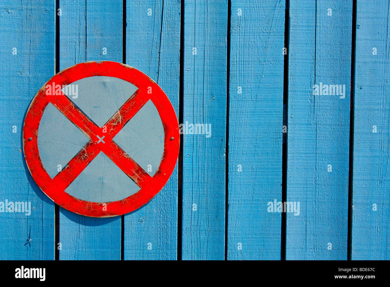 A sign on a wood wall Stock Photo - Alamy