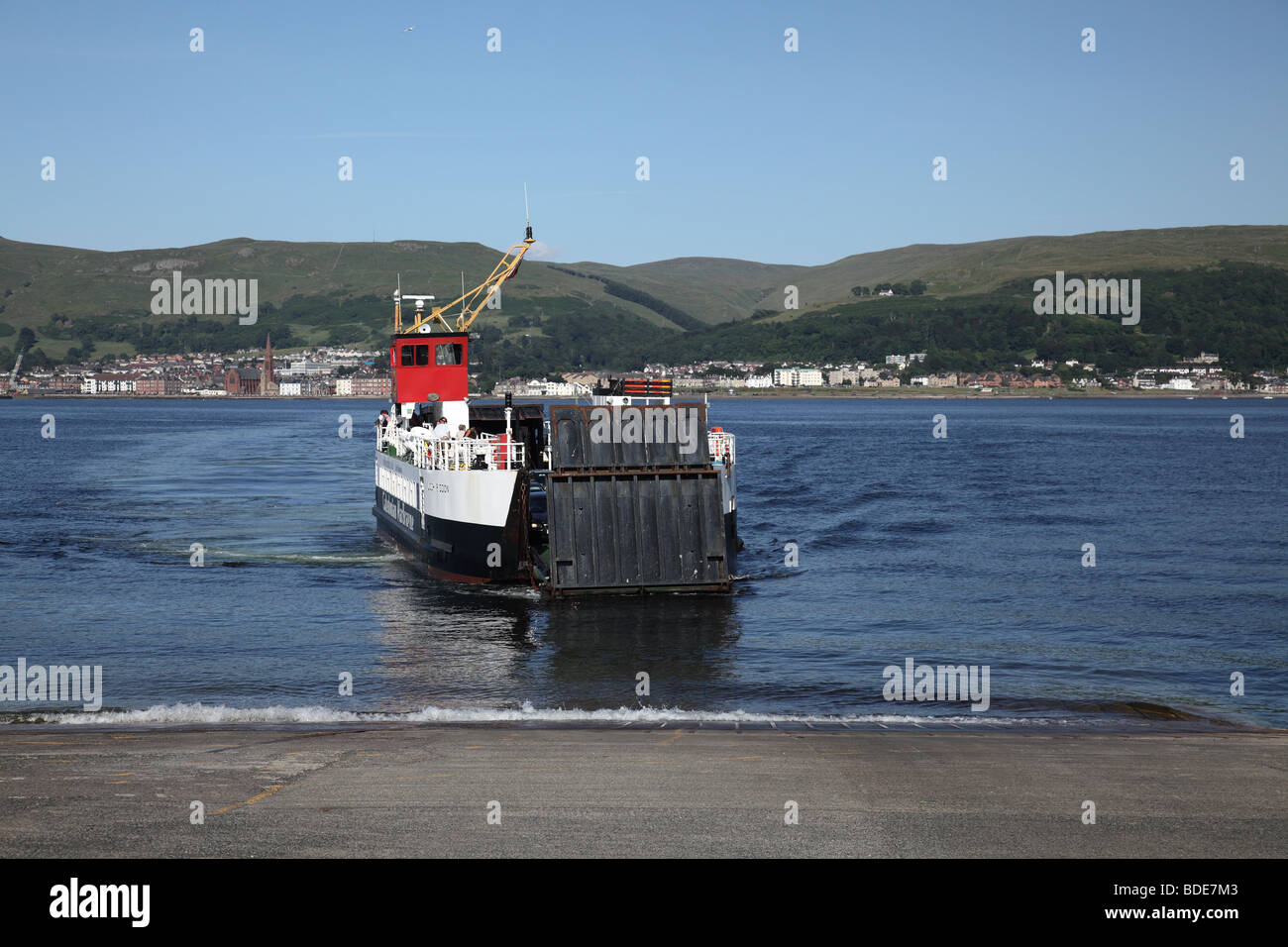 Calmac Ferry arriving at the slipway on Great Cumbrae after sailing ...