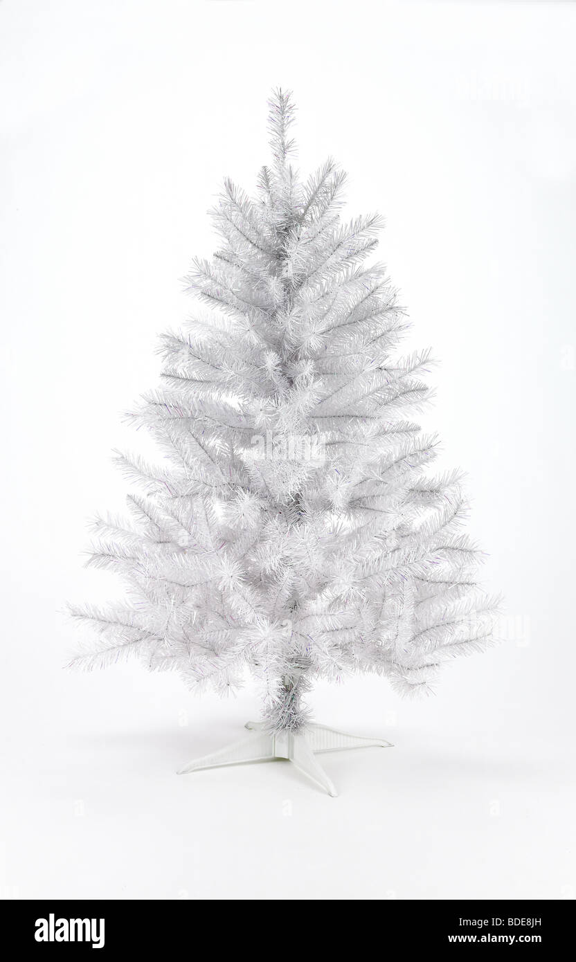 White Xmas Tree sitting on white background Stock Photo - Alamy