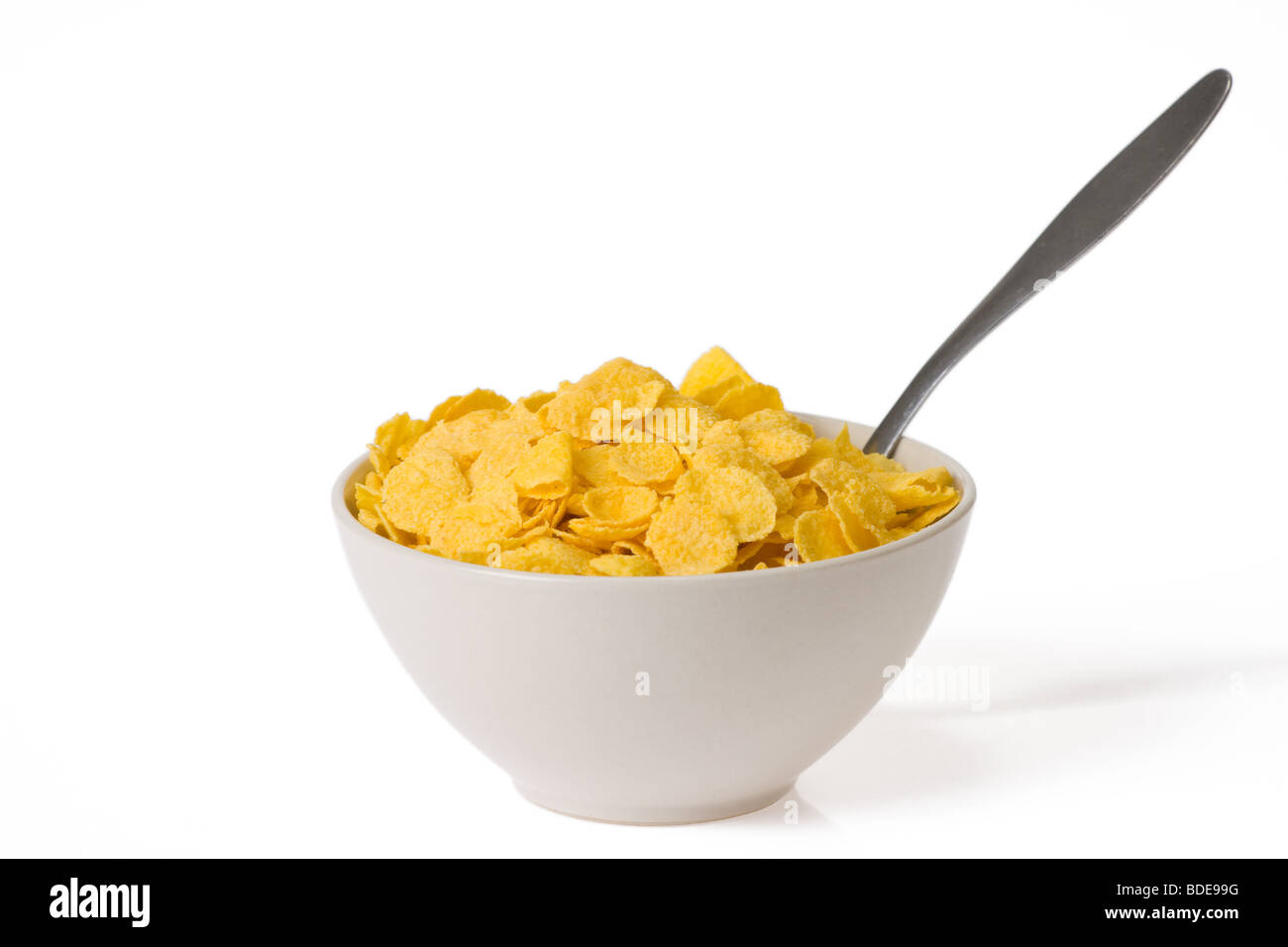 cornflakes in bowl on white background Stock Photo - Alamy