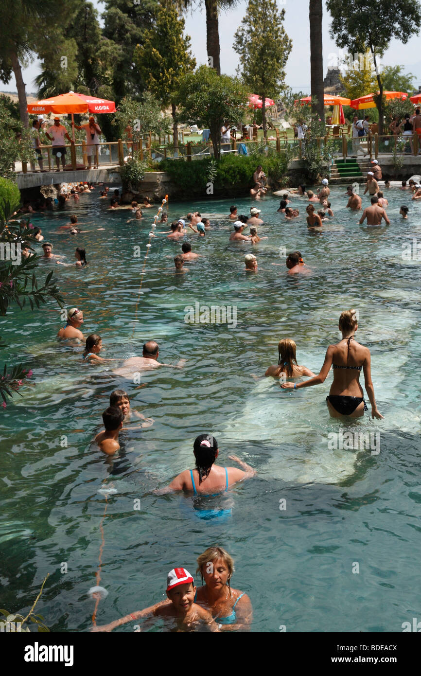 People is swimming in the antique ancient pool at Pamukkale (Hierapolis ...