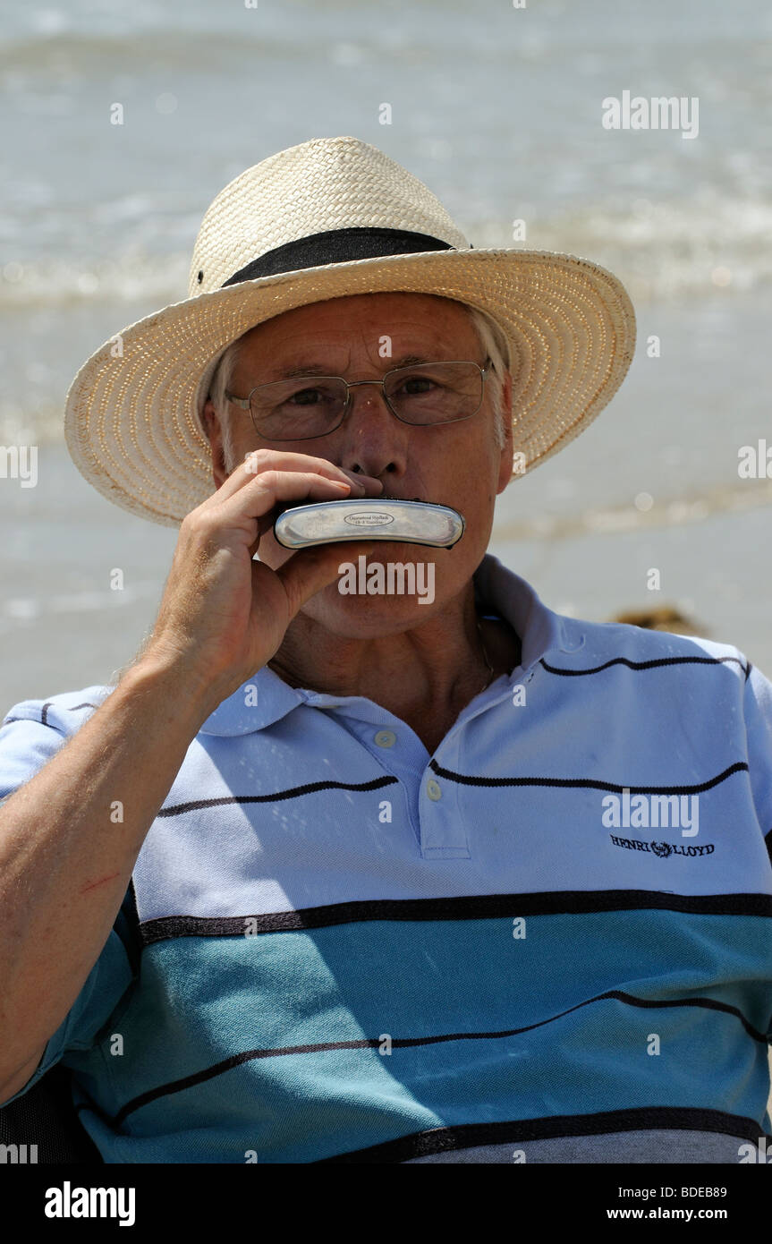 Portrait of a man drinking from a hip flask Stock Photo - Alamy