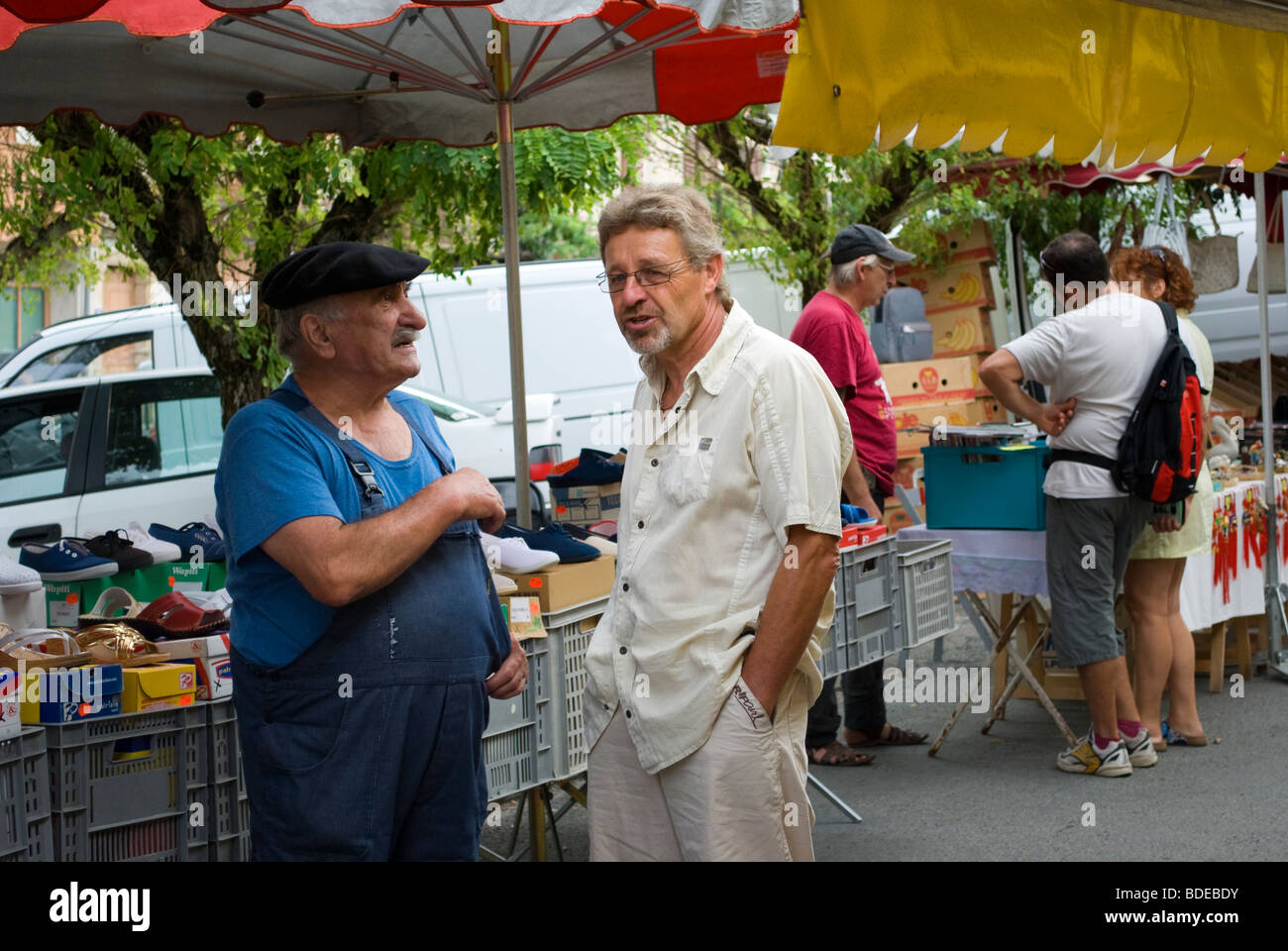Two men talking france hi-res stock photography and images - Alamy