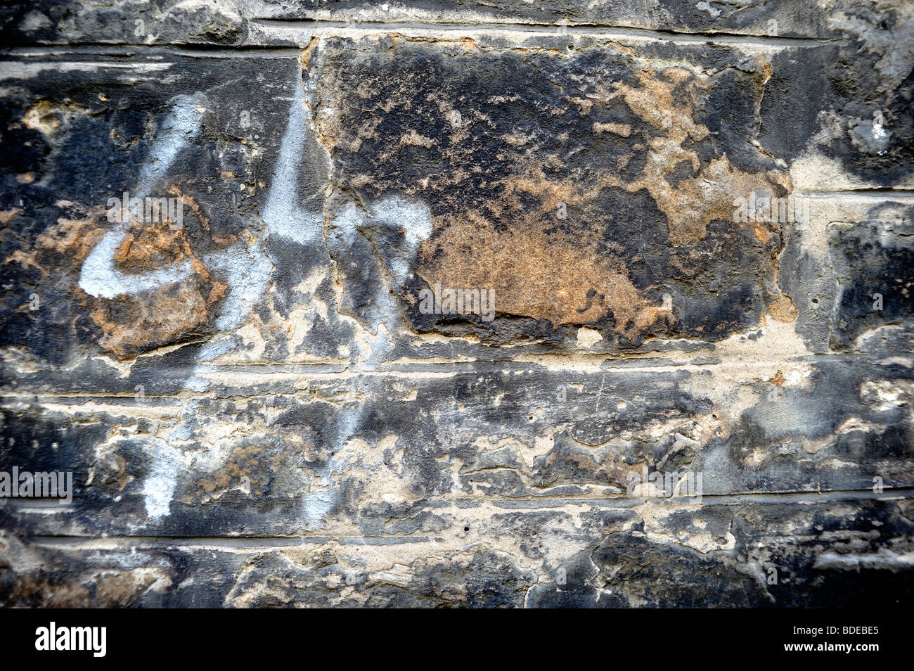 Graffiti on a stone wall Stock Photo - Alamy