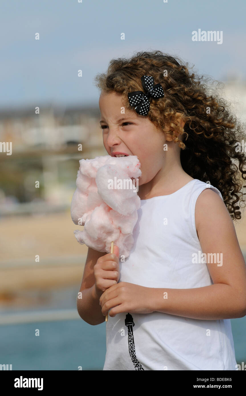 Child candy floss seaside hi-res stock photography and images - Alamy