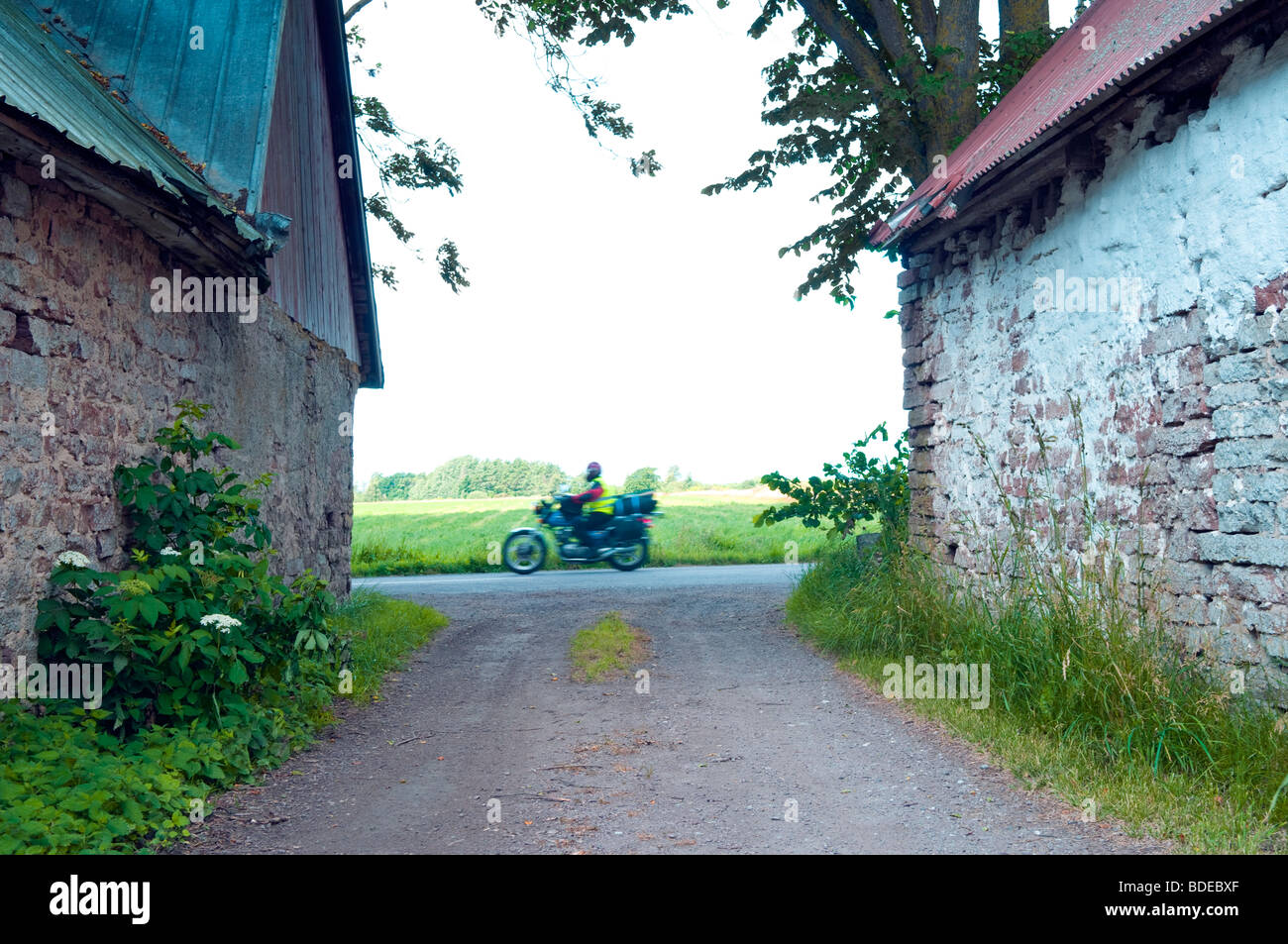 Biker passing hi-res stock photography and images - Alamy
