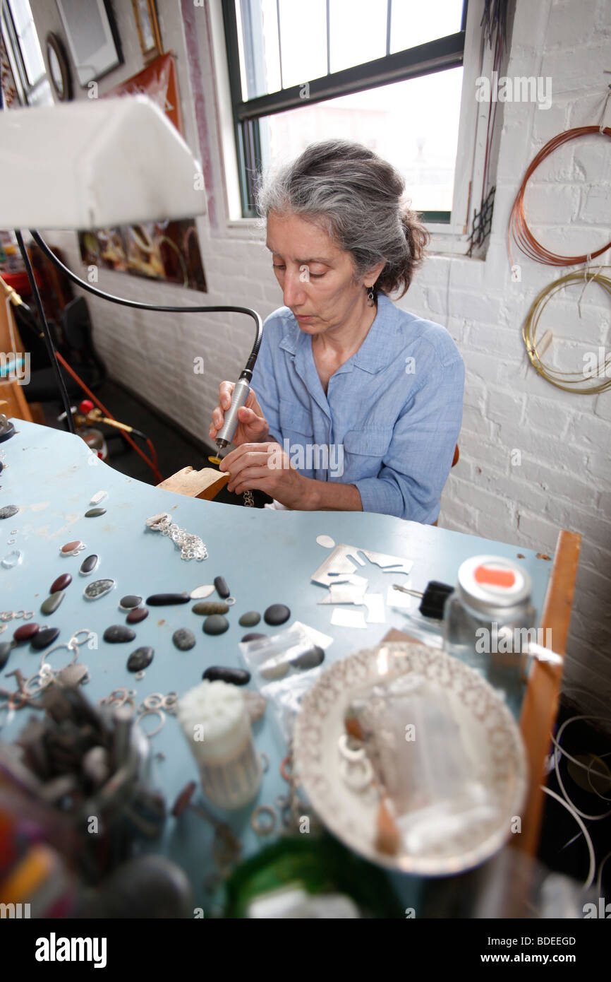 A jeweler at work in her studio, Boston, Massachusetts Stock Photo - Alamy