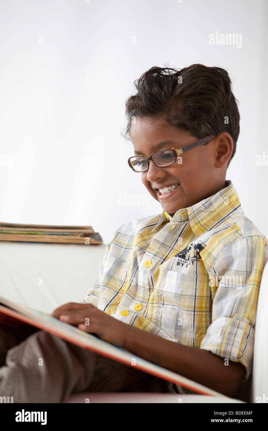 Boy reading cartoons hi-res stock photography and images - Alamy