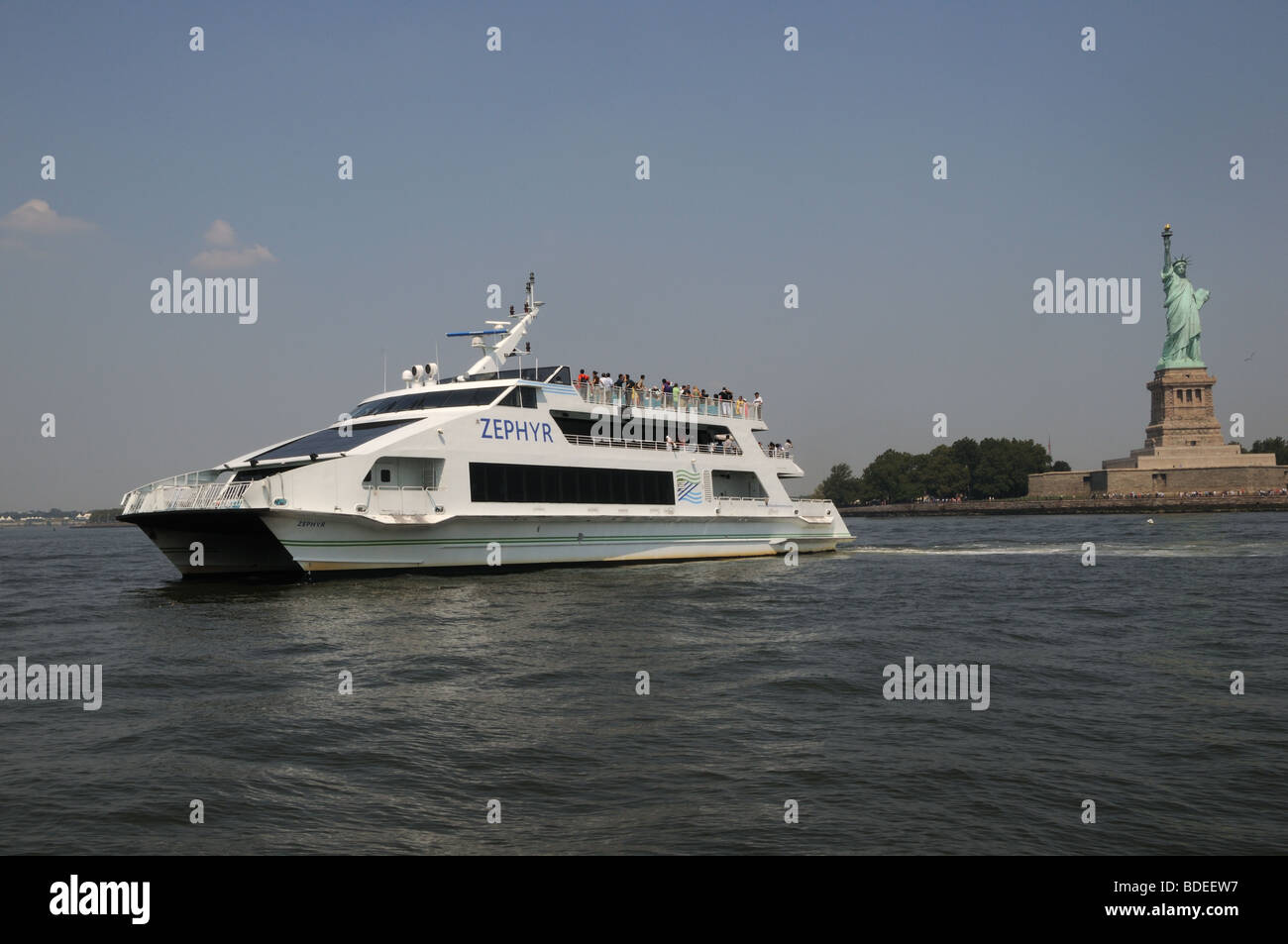 In summer, boats ply New York harbor, bringing tourists to see the ...