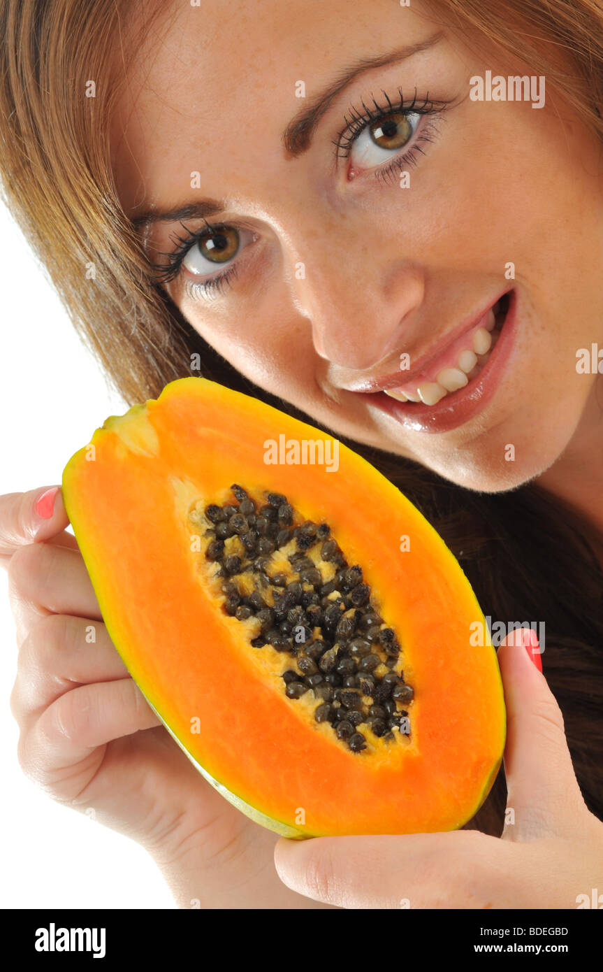 Mango, Woman holding a cut open mango Stock Photo - Alamy